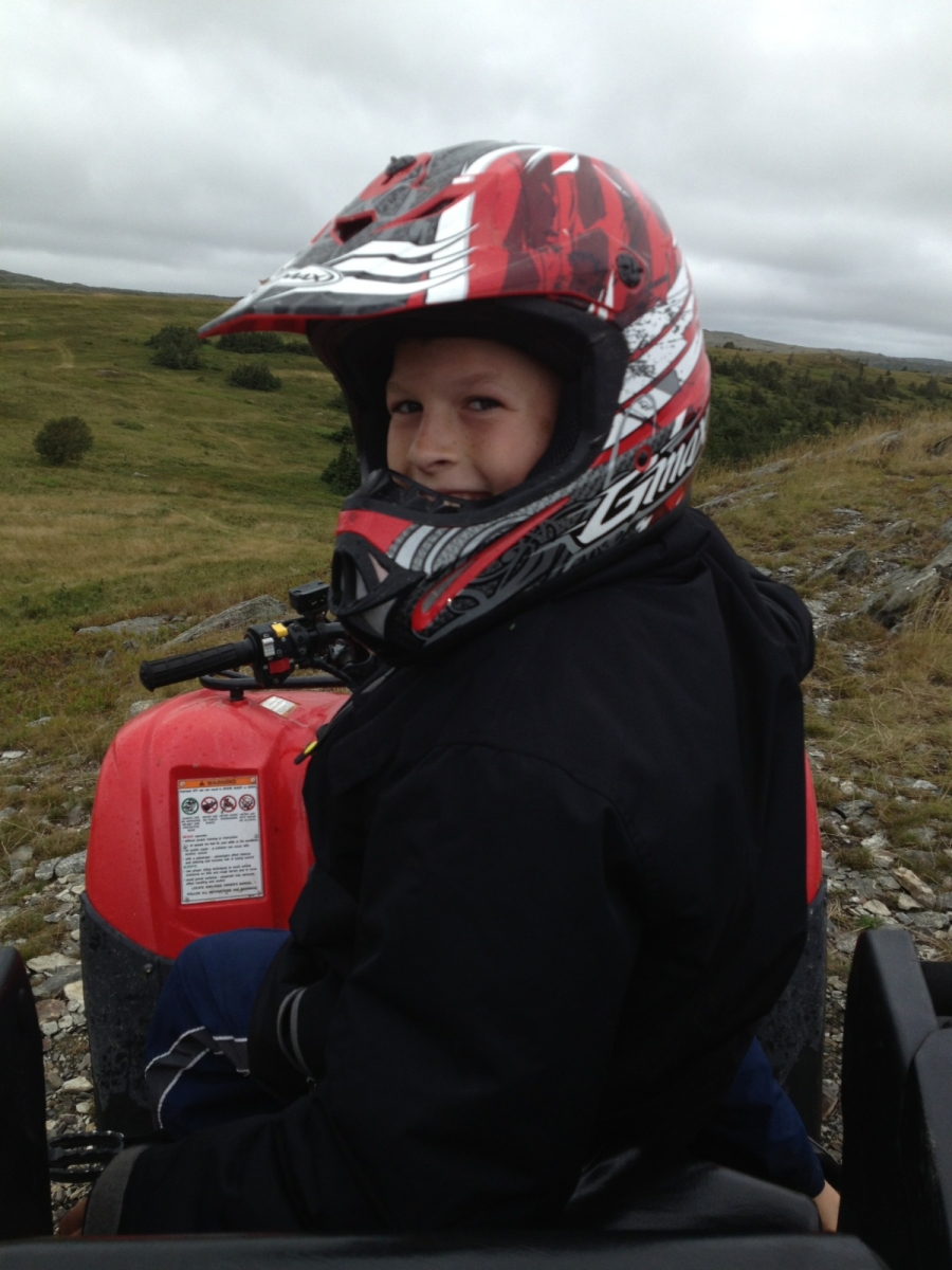 Cale on ATV - Downhome Magazine