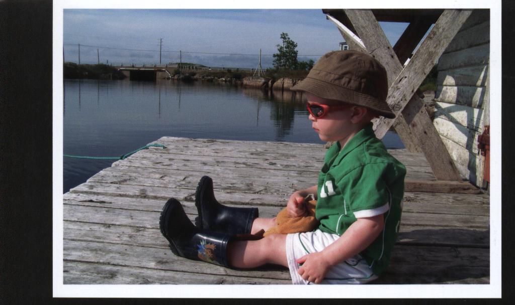 I love sitting On Granda Terry's wharf in Badger's Quay - Downhome Magazine